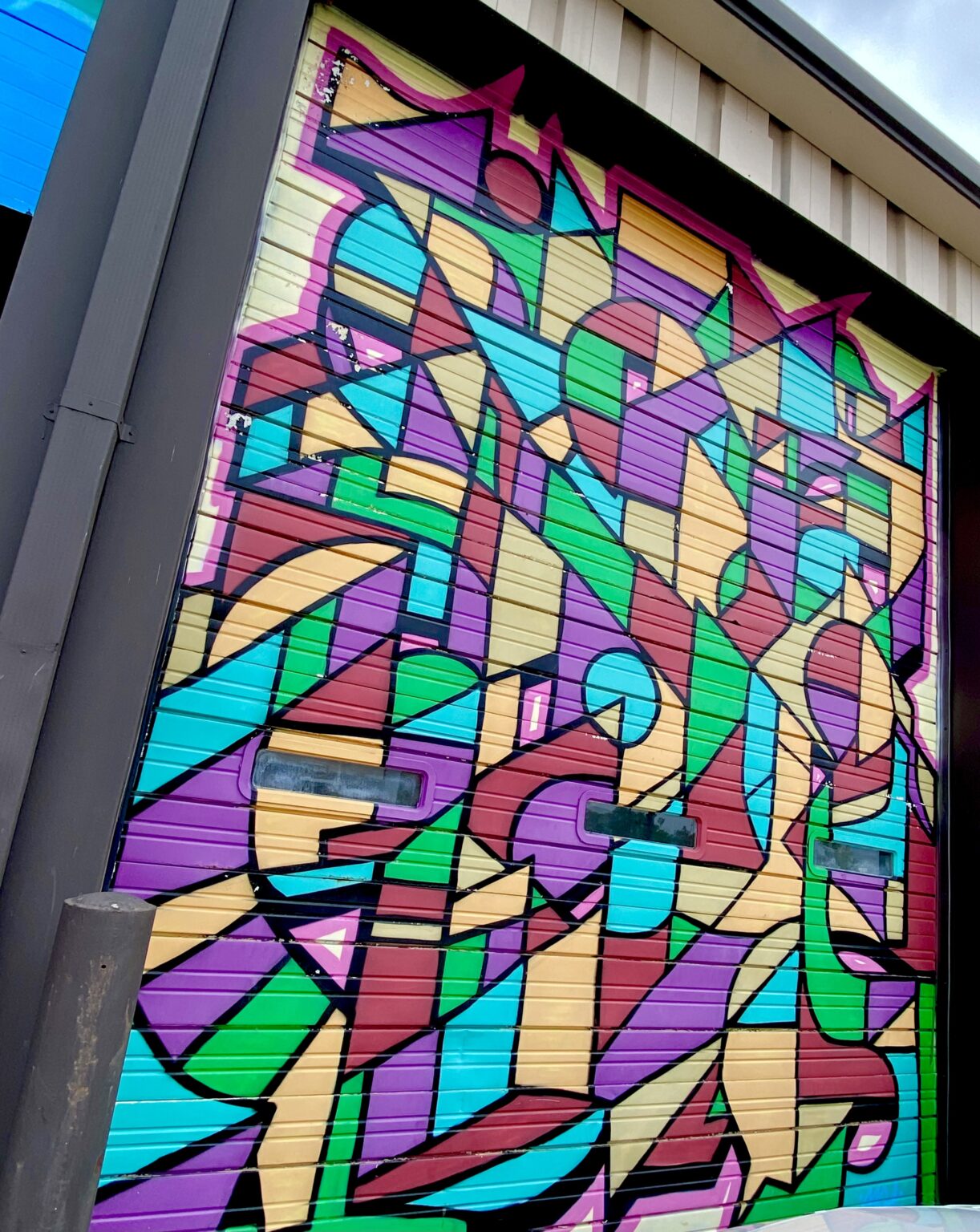 Garage Door Graffiti at Artisan Forge Studios – Eau Claire, Wisconsin ...